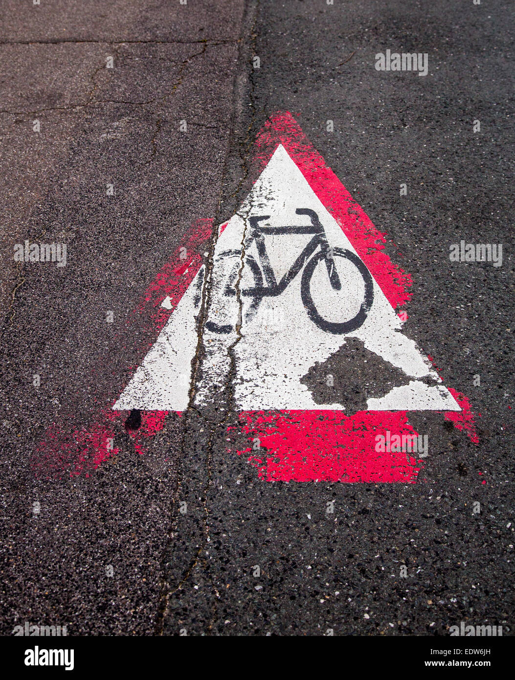 Traffic signs for bike path, painted on the pavement, worn Stock Photo ...