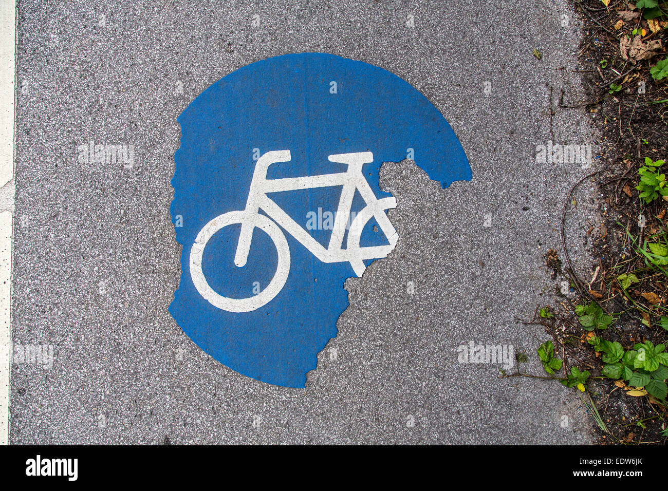 Traffic signs for bike path, painted on the pavement, worn Stock Photo ...