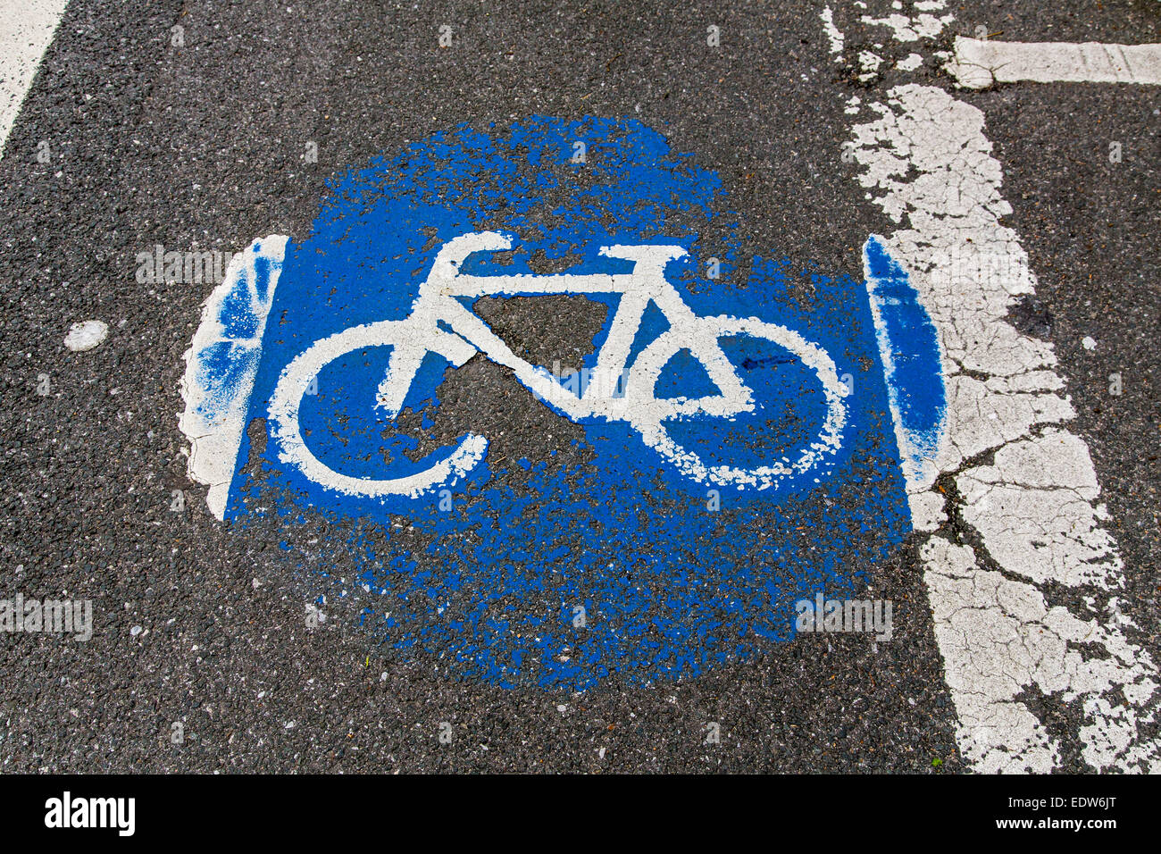 Traffic signs for bike path, painted on the pavement, worn Stock Photo ...