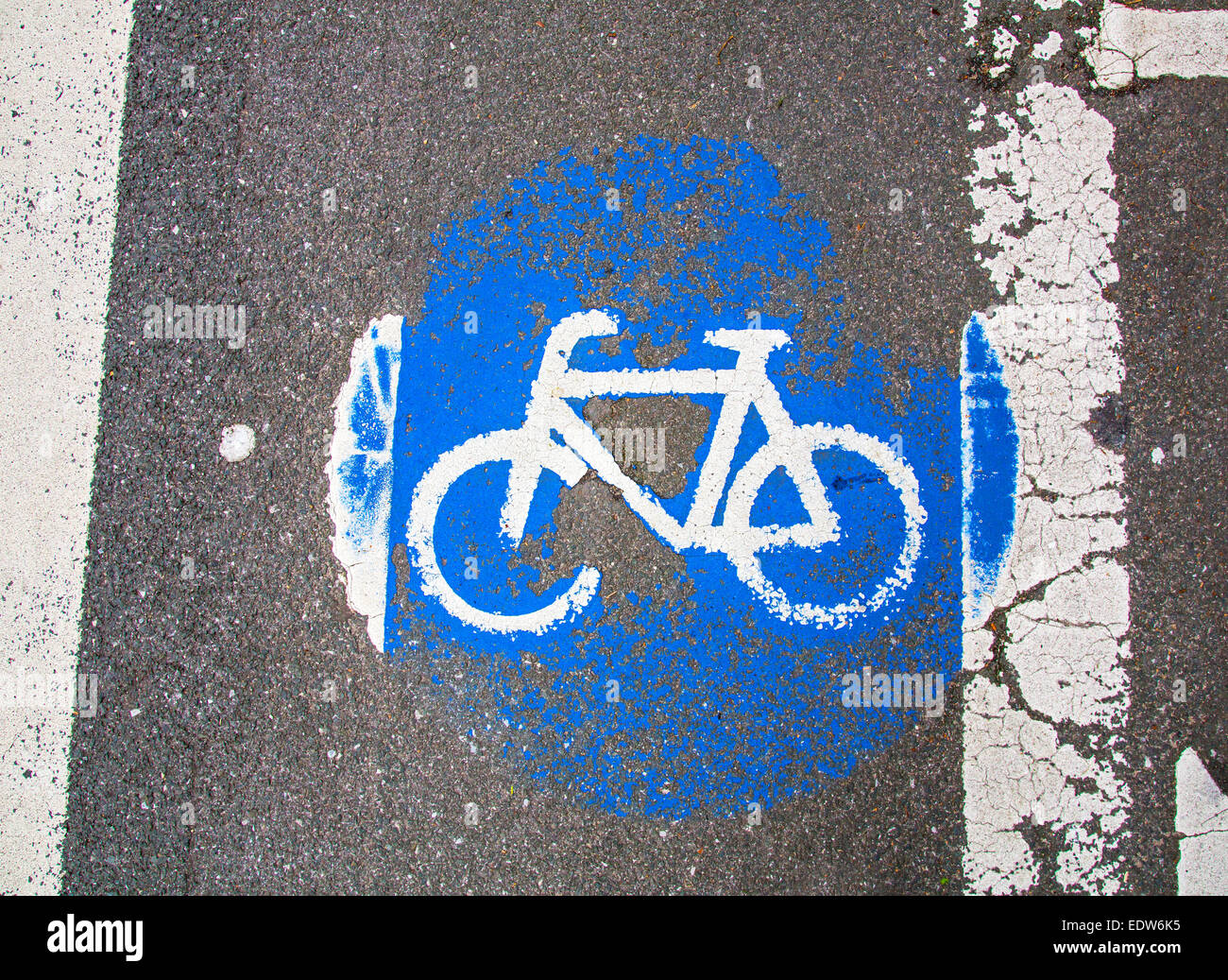 Traffic signs for bike path, painted on the pavement, worn Stock Photo ...