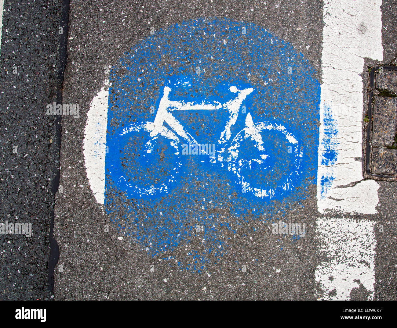 Traffic signs for bike path, painted on the pavement, worn Stock Photo ...