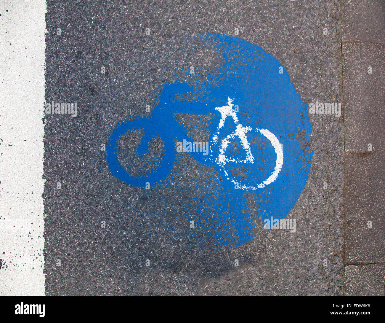 Traffic signs for bike path, painted on the pavement, worn Stock Photo ...