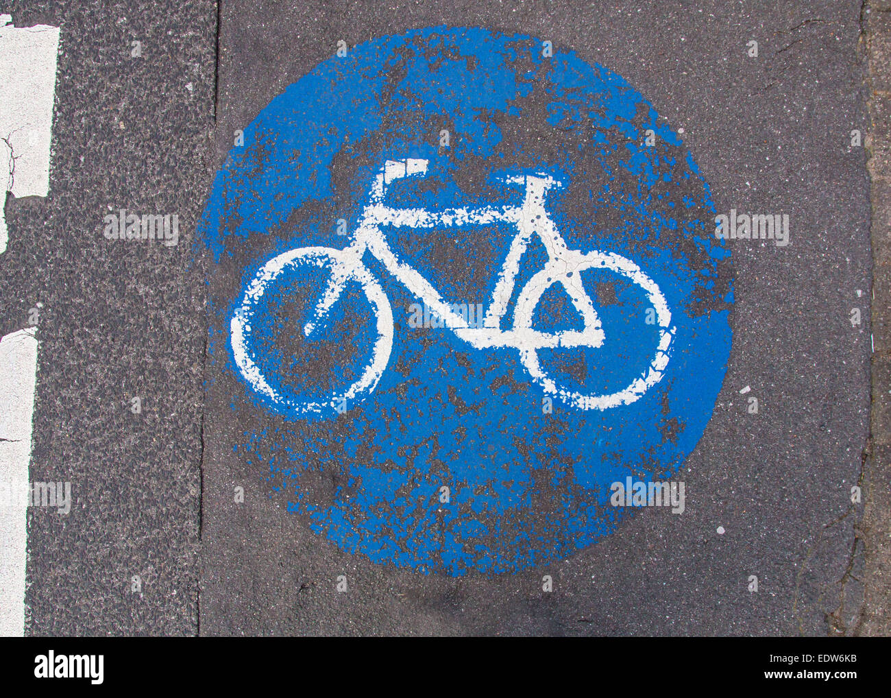 Traffic signs for bike path, painted on the pavement, worn Stock Photo ...
