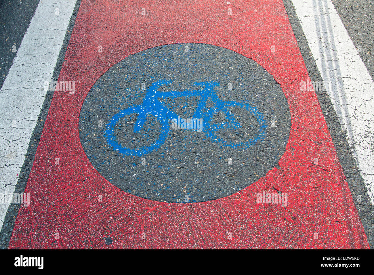 Traffic signs for bike path, painted on the pavement, worn Stock Photo ...