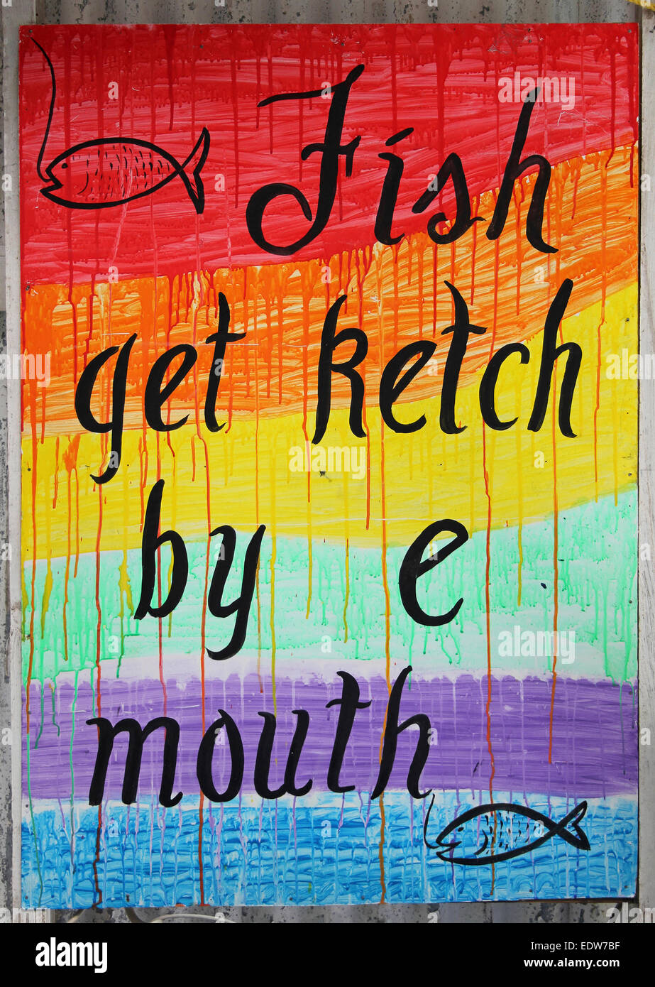 Creole Saying "Fish Get Ketch By e Mouth" in Marin's Restaurant, Caye ...