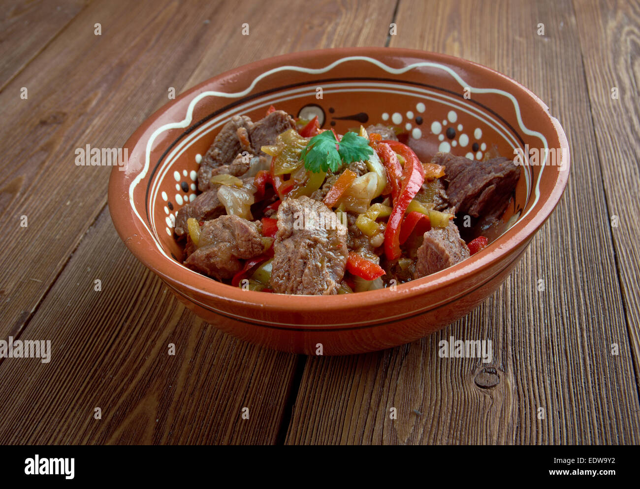 buglama - Uzbek Cuisine traditional dish with lamb and vegetables Stock ...