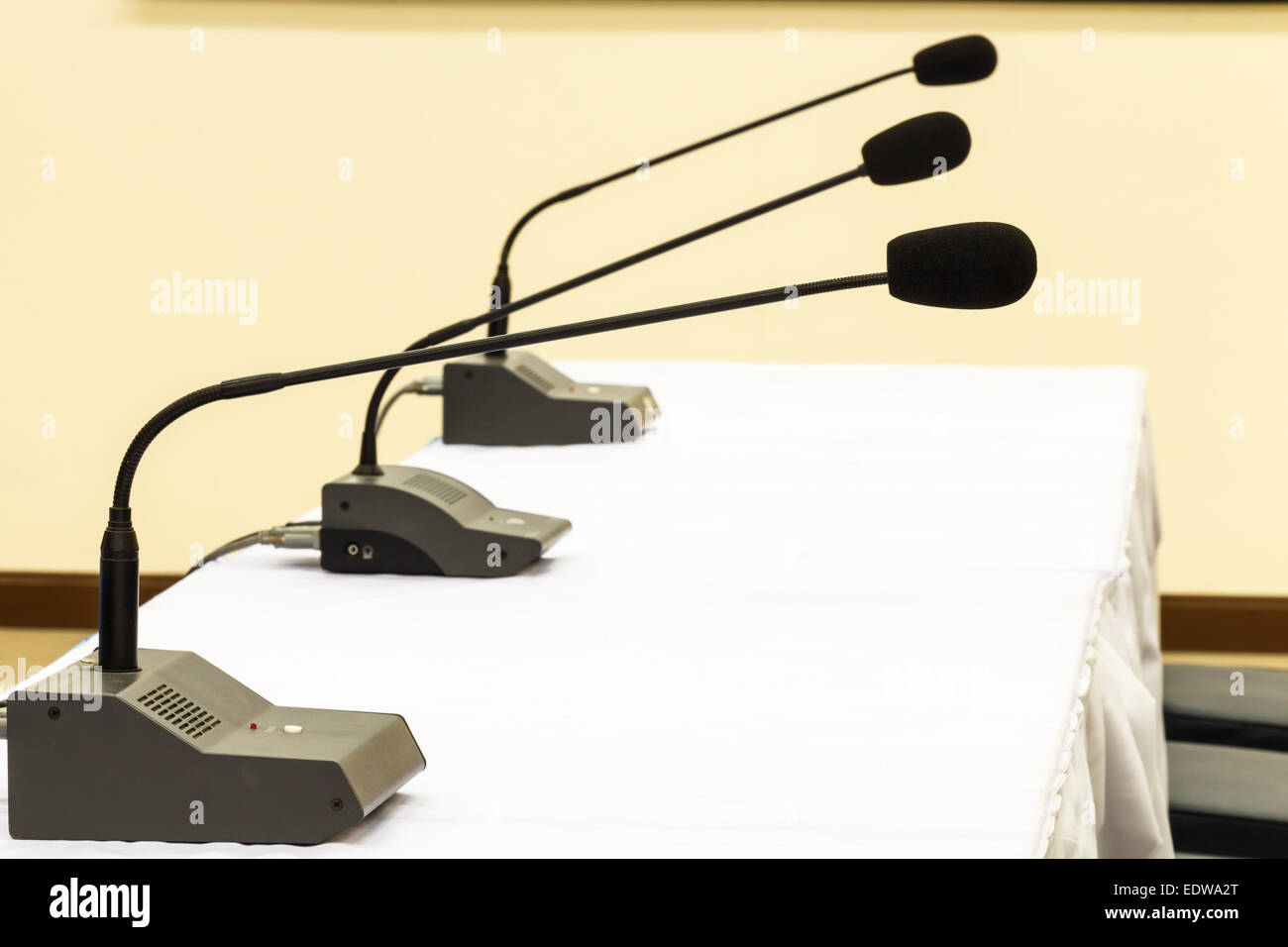 Microphones on conference table hi-res stock photography and images - Alamy