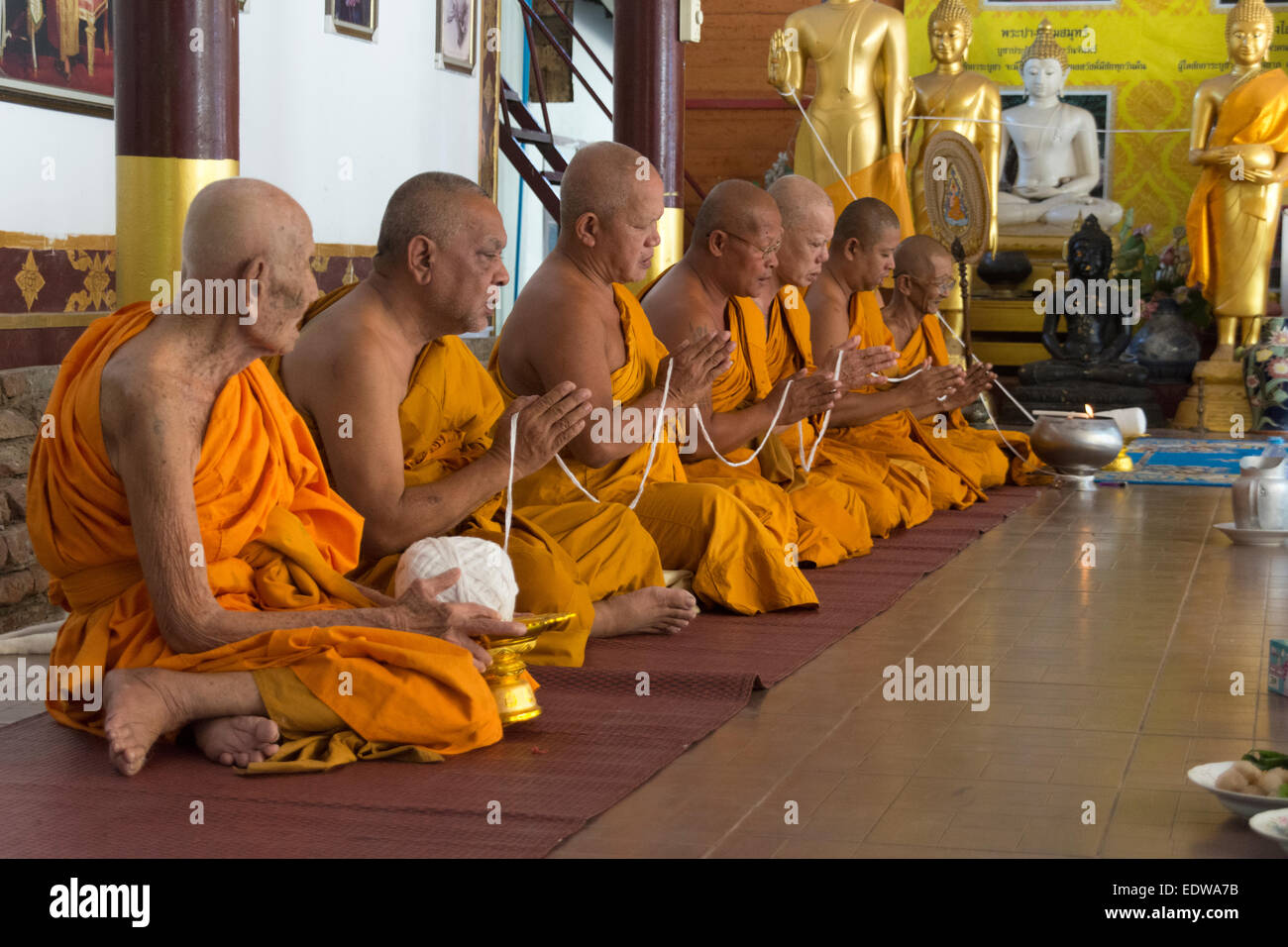 Thai monks in meditation at a temple in Central Thailand Stock Photo ...