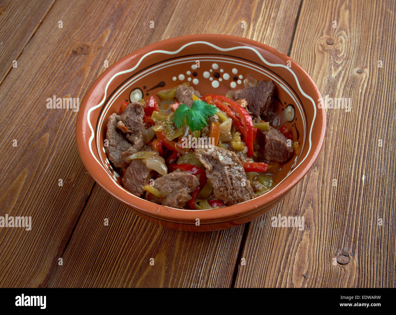 buglama - Uzbek Cuisine traditional dish with lamb and vegetables Stock ...