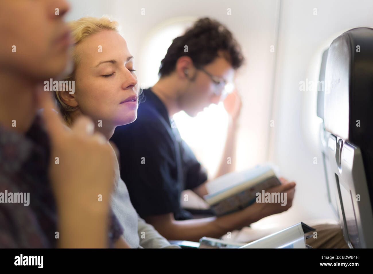 People flying by plane Stock Photo - Alamy