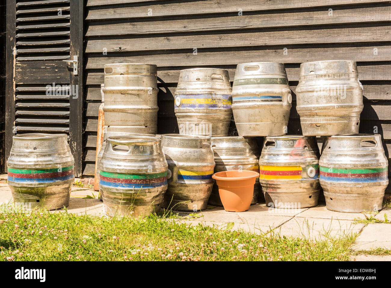 Beer barrels stacked behind chichester hi-res stock photography and ...