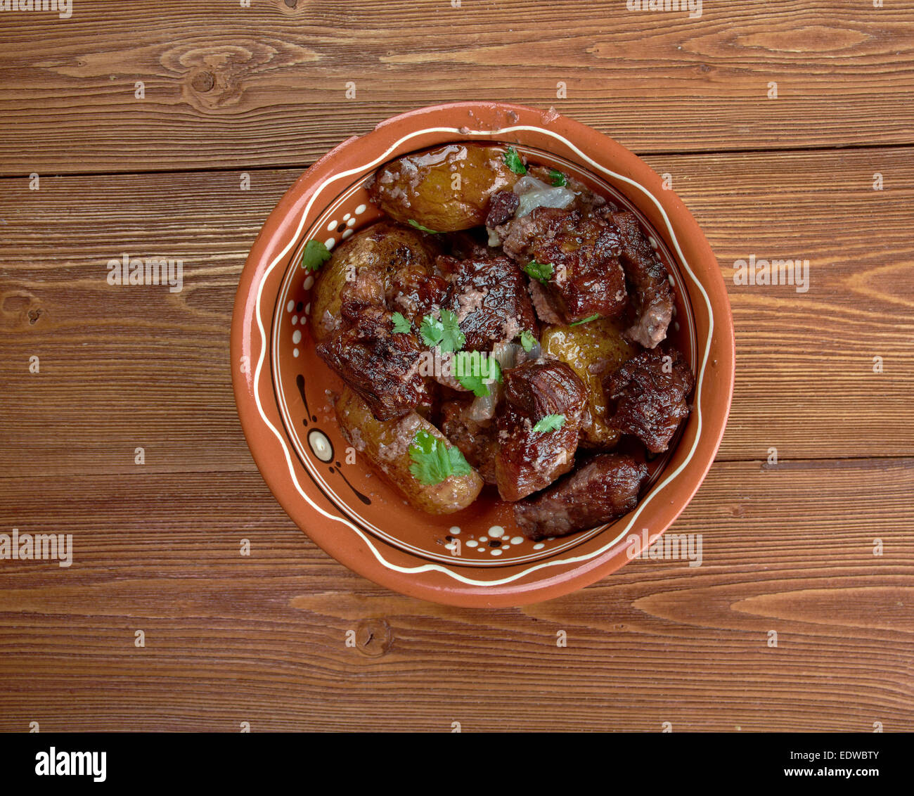 Afelia - a traditional Greek and Cypriot food. pork marinated and ...