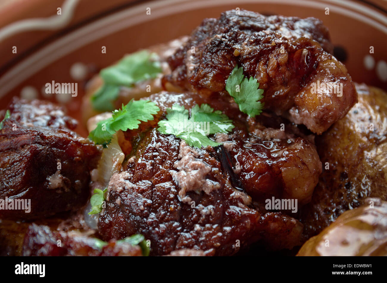 Afelia - a traditional Greek and Cypriot food. pork marinated and ...