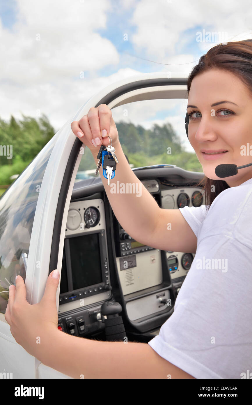 Female airline pilot in cockpit hi-res stock photography and images - Alamy