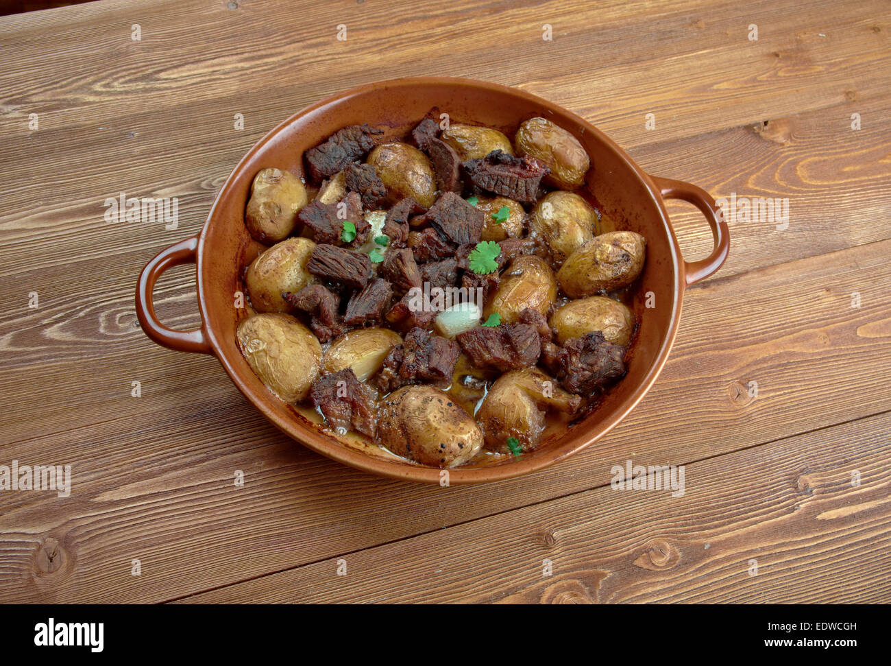 Afelia - a traditional Greek and Cypriot food. pork marinated and ...