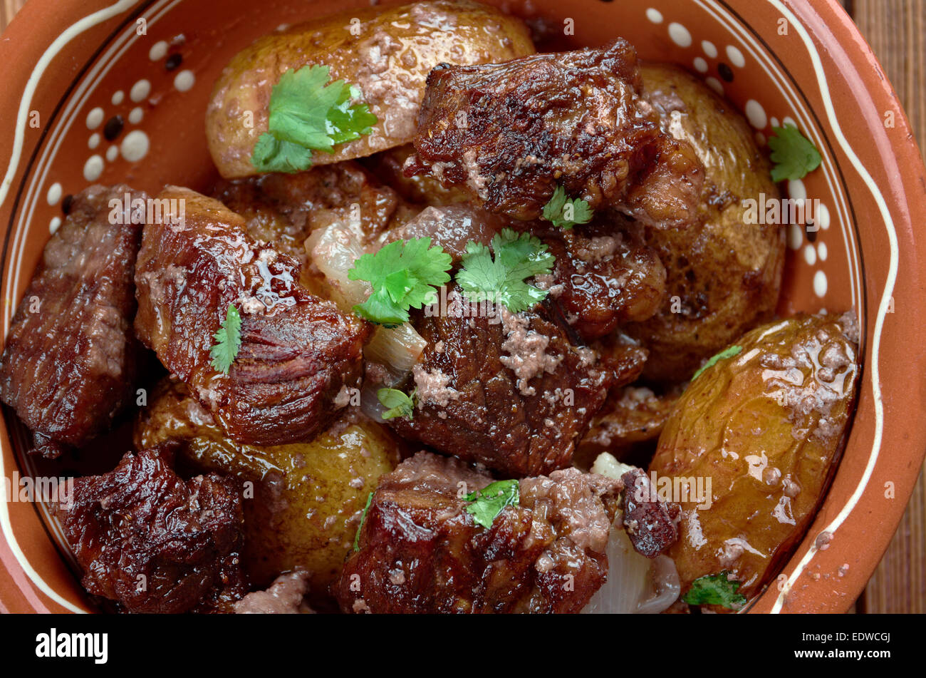 Afelia - a traditional Greek and Cypriot food. pork marinated and ...