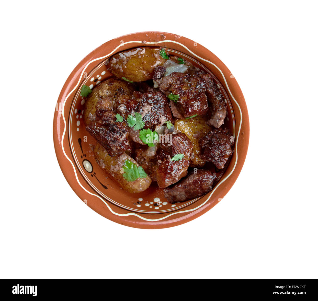 Afelia - a traditional Greek and Cypriot food. pork marinated and ...