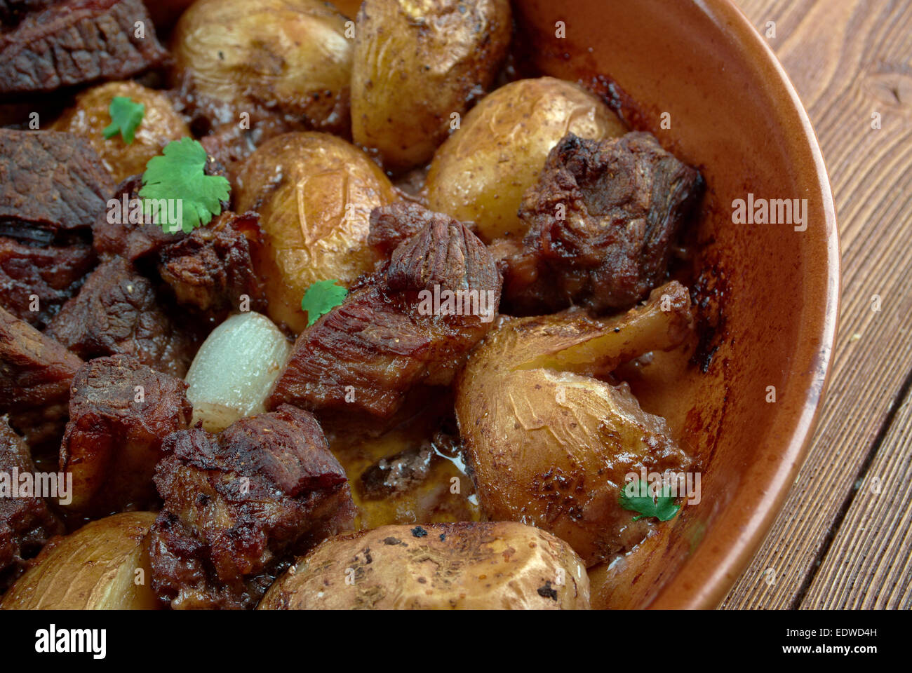 Afelia - a traditional Greek and Cypriot food. pork marinated and ...