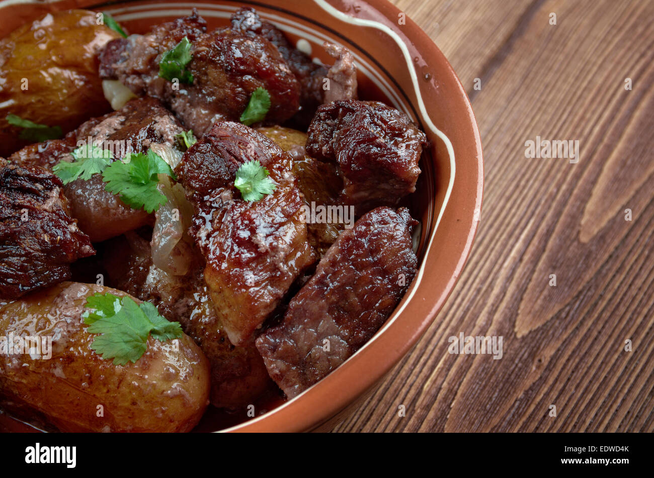 Afelia - a traditional Greek and Cypriot food. pork marinated and ...