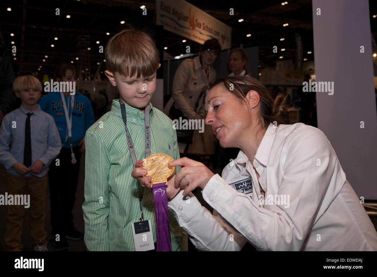 Paralympic Gold medallist Helena Lucas shows her Gold medal to Elliot ...