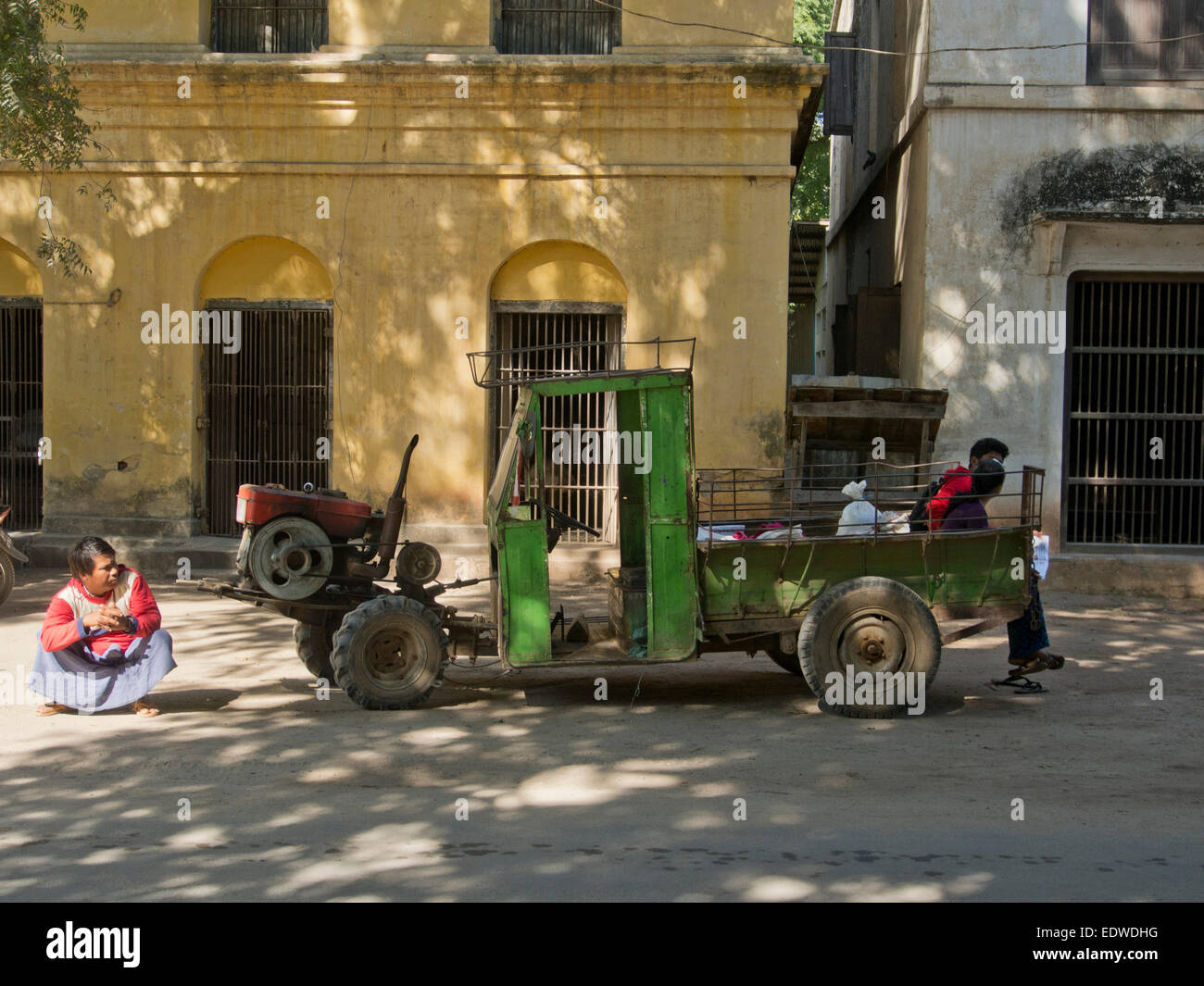 Converted tractor in a street in a town in central Myanmar Stock Photo ...