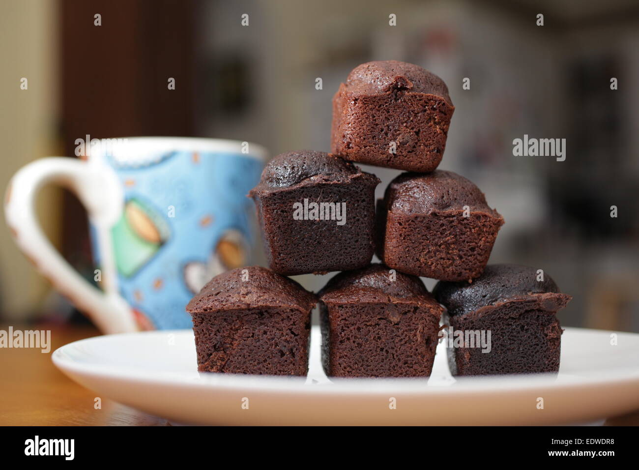 Stack of mini brownies on a plate Stock Photo - Alamy
