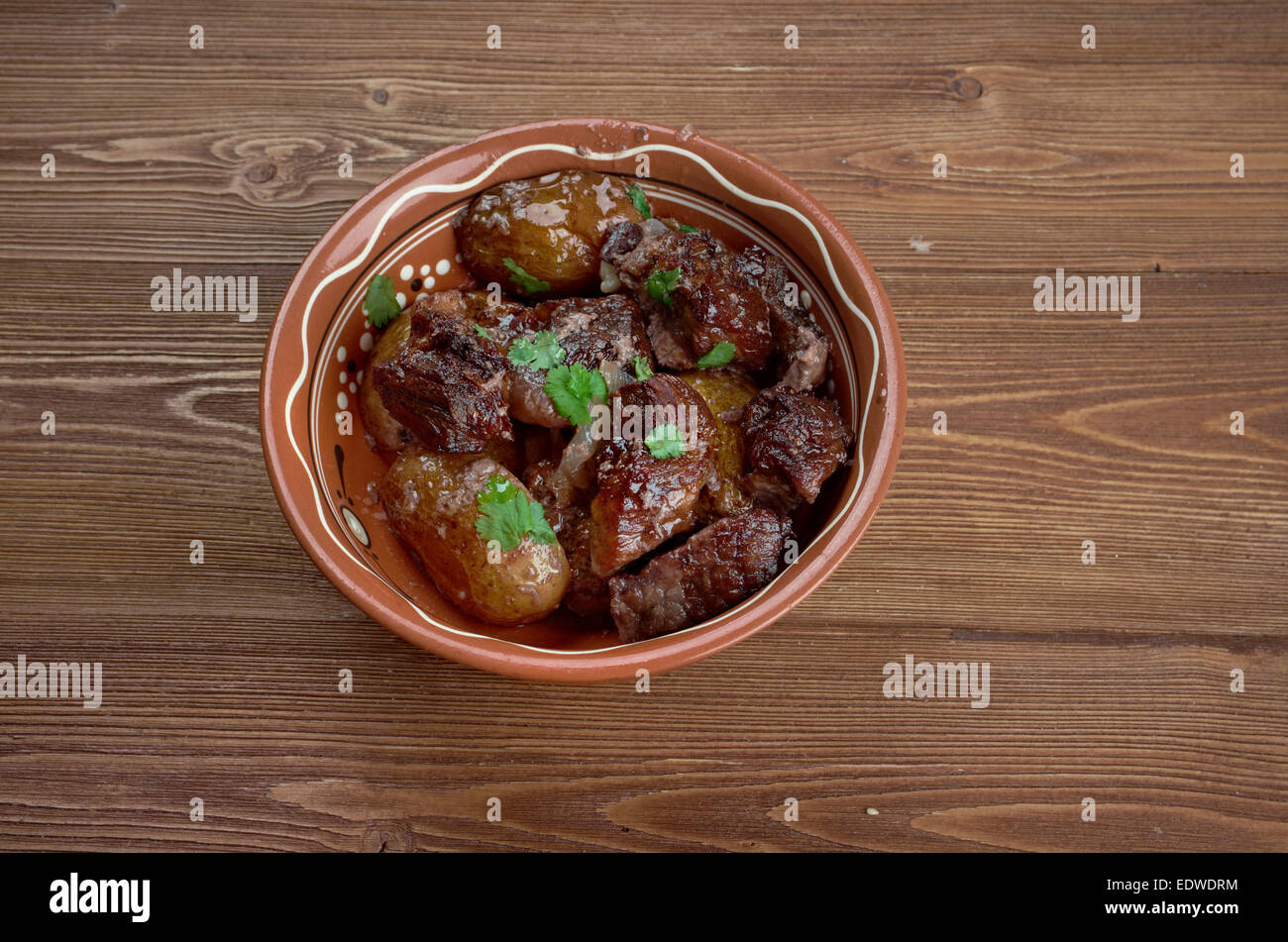 Afelia - a traditional Greek and Cypriot food. pork marinated and ...