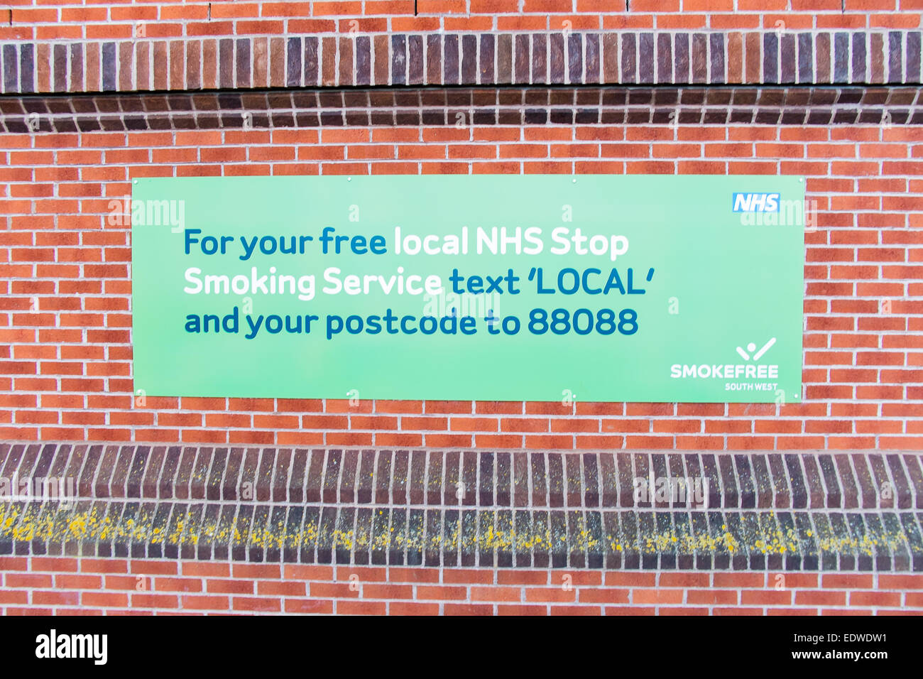 NHS wall banner stop smoking service Stock Photo - Alamy