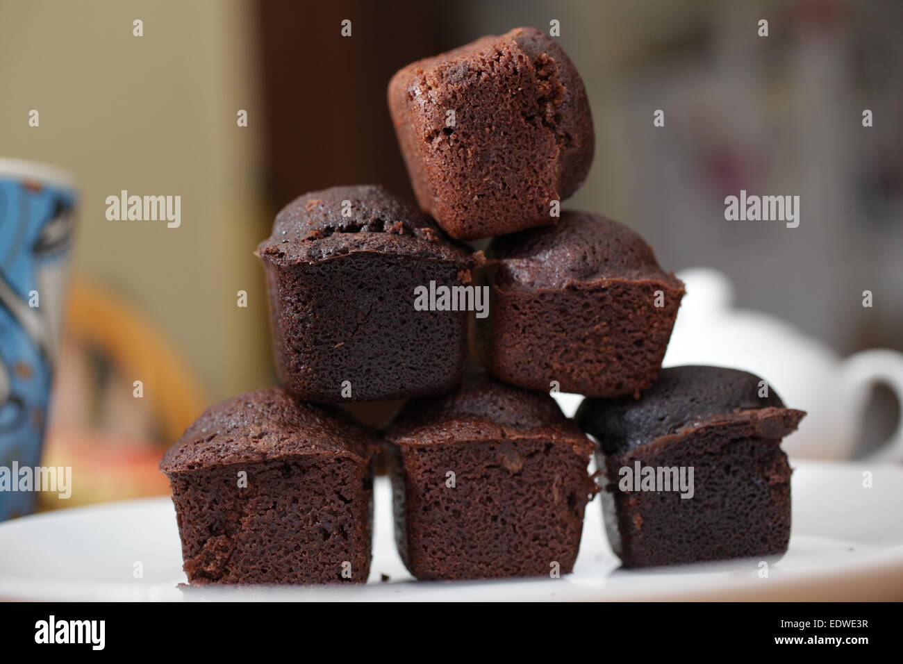 Stack of mini brownies on a plate Stock Photo - Alamy