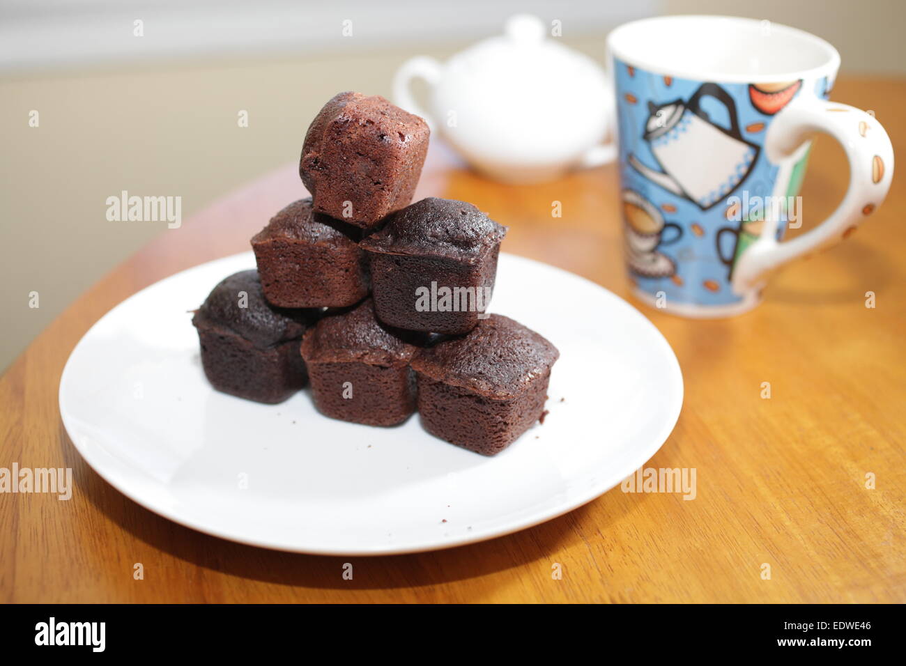 Stack of mini brownies on a plate Stock Photo - Alamy