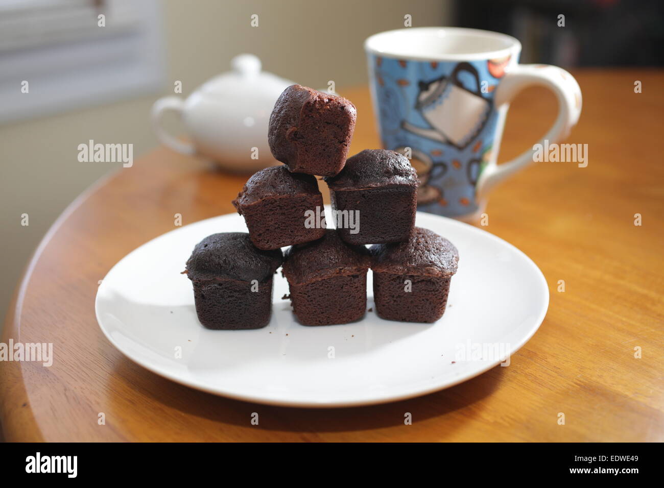 Stack of mini brownies on a plate Stock Photo - Alamy