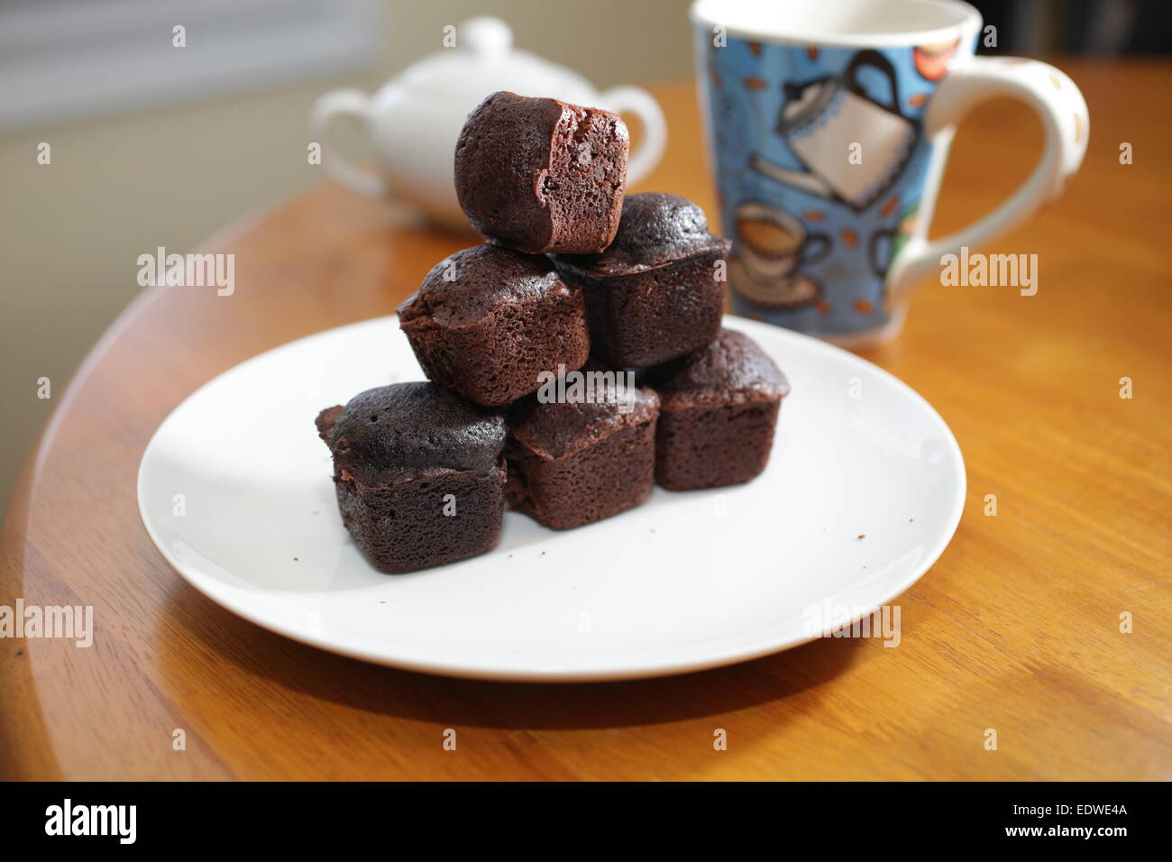 Stack of mini brownies on a plate Stock Photo - Alamy