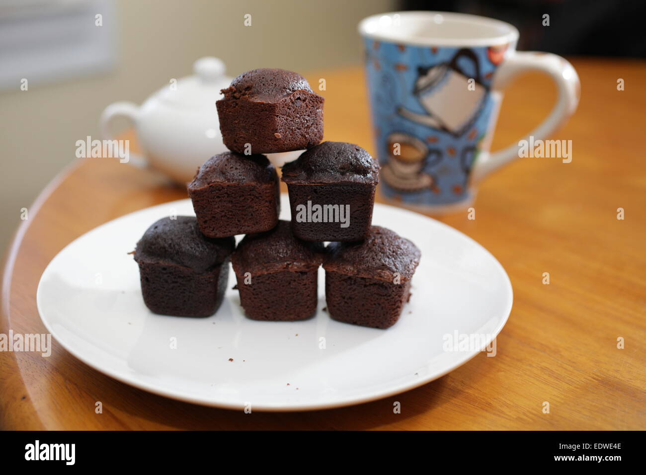 Stack of mini brownies on a plate Stock Photo - Alamy