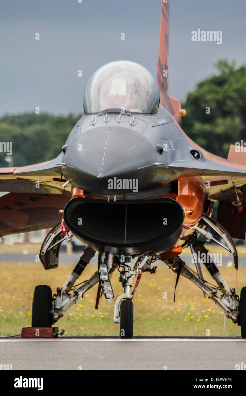 A Dutch F16 of the demonstration team stationary at Gilze-Rijen airport ...