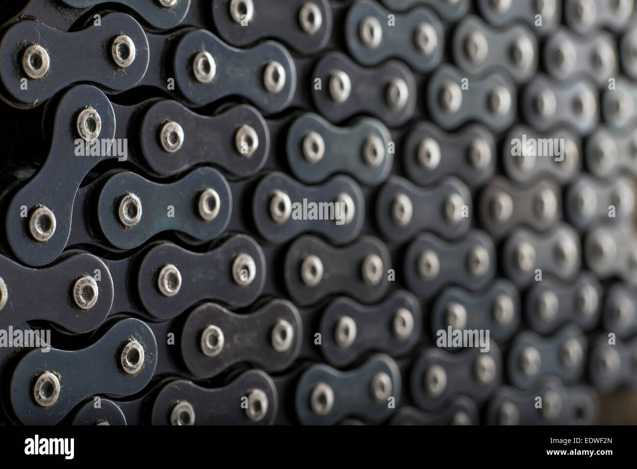 Cycle chain in the grease can be used as a background Stock Photo - Alamy