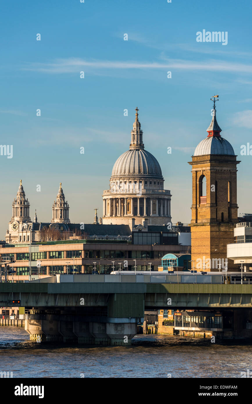 View across the River Thames to cannon Street rail station and St Paul ...