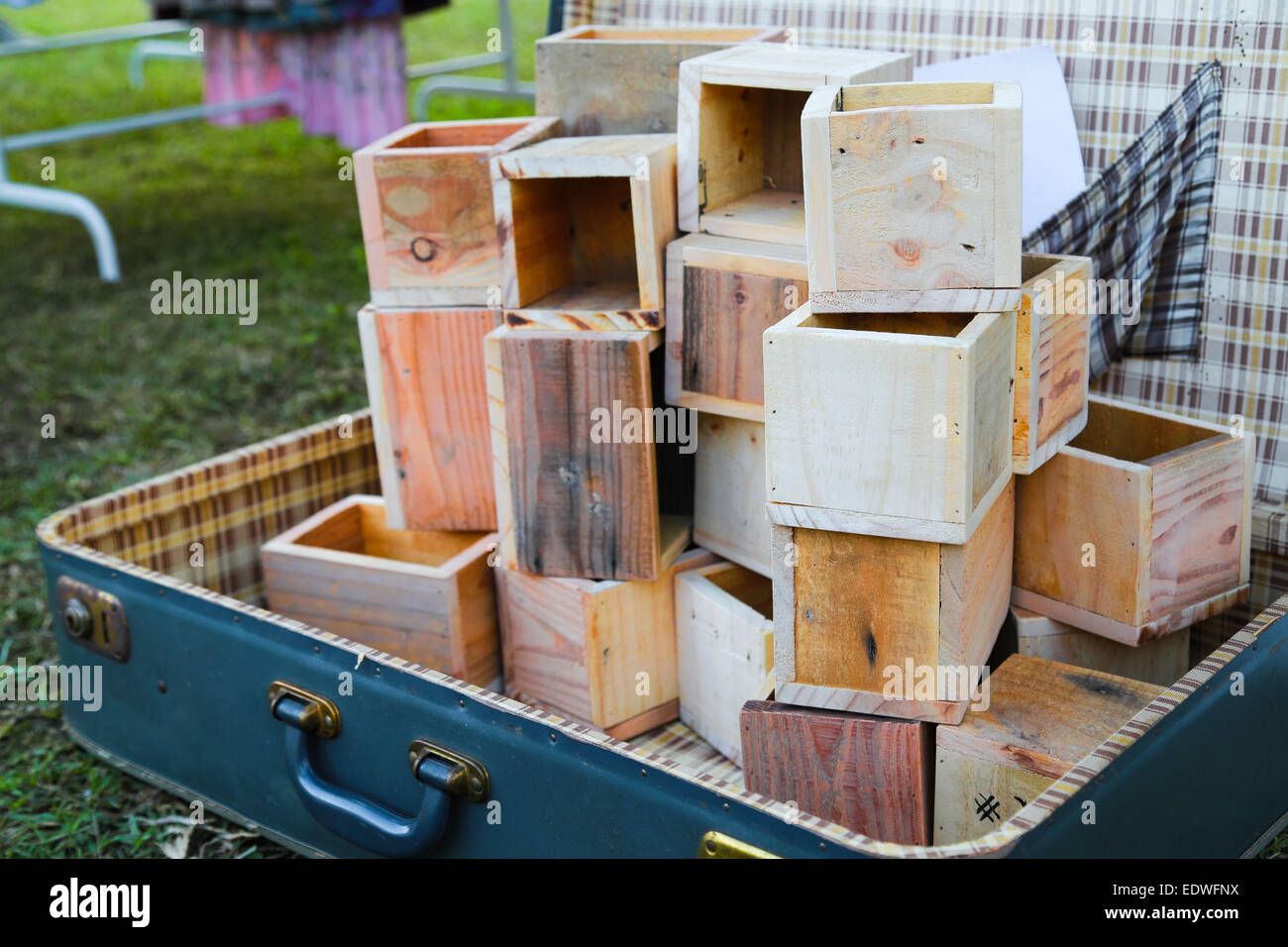 Wooden boxes in a vintage luggage briefcase Stock Photo - Alamy
