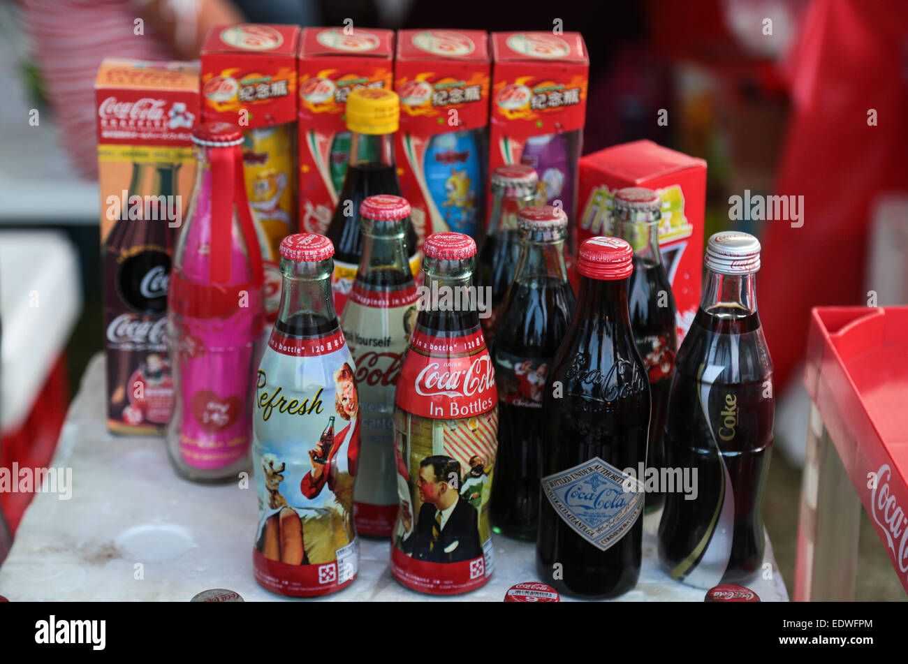 Various classic coca-cola bottles Stock Photo - Alamy