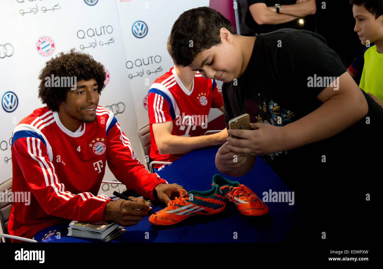 Doha, Qatar. 10th Jan, 2015. Munich's players Dante (L) and Thomas ...