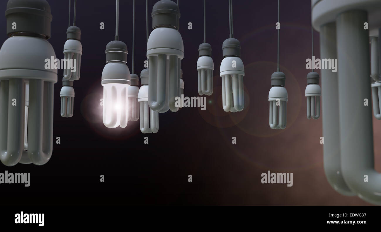 A concept image showing unlit dangling flourescent light bulbs with one ...