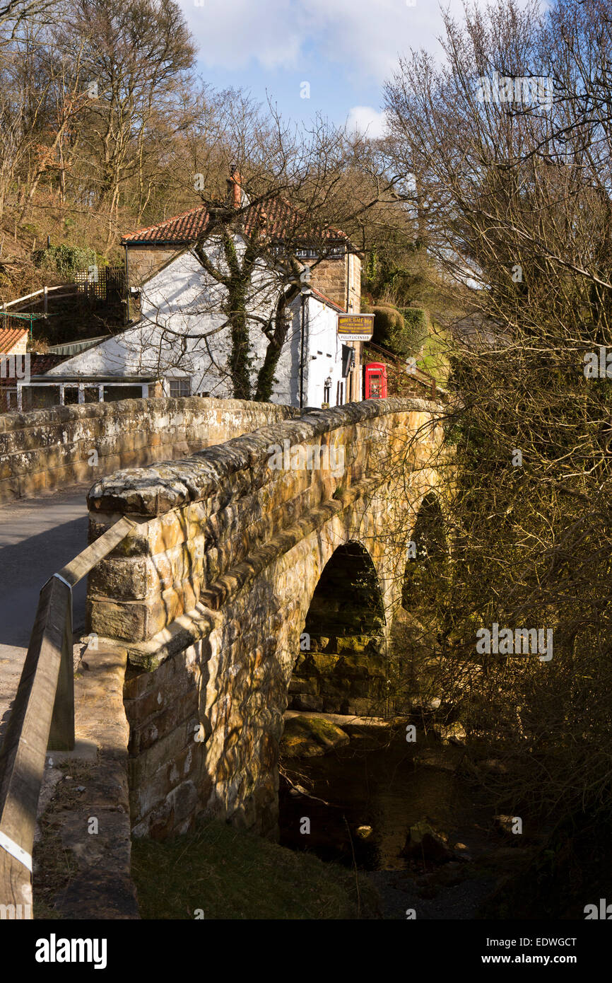 UK, England, Yorkshire, Goathland, Beck Hole, old stone bridge over ...