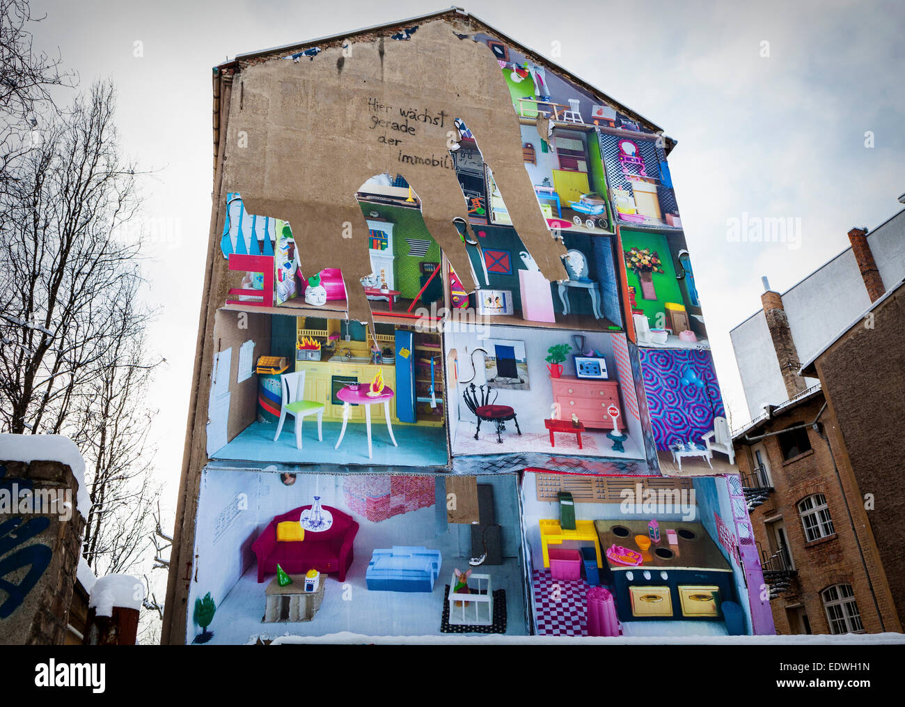 Torn Paper street art - side of a building with illustration of ...