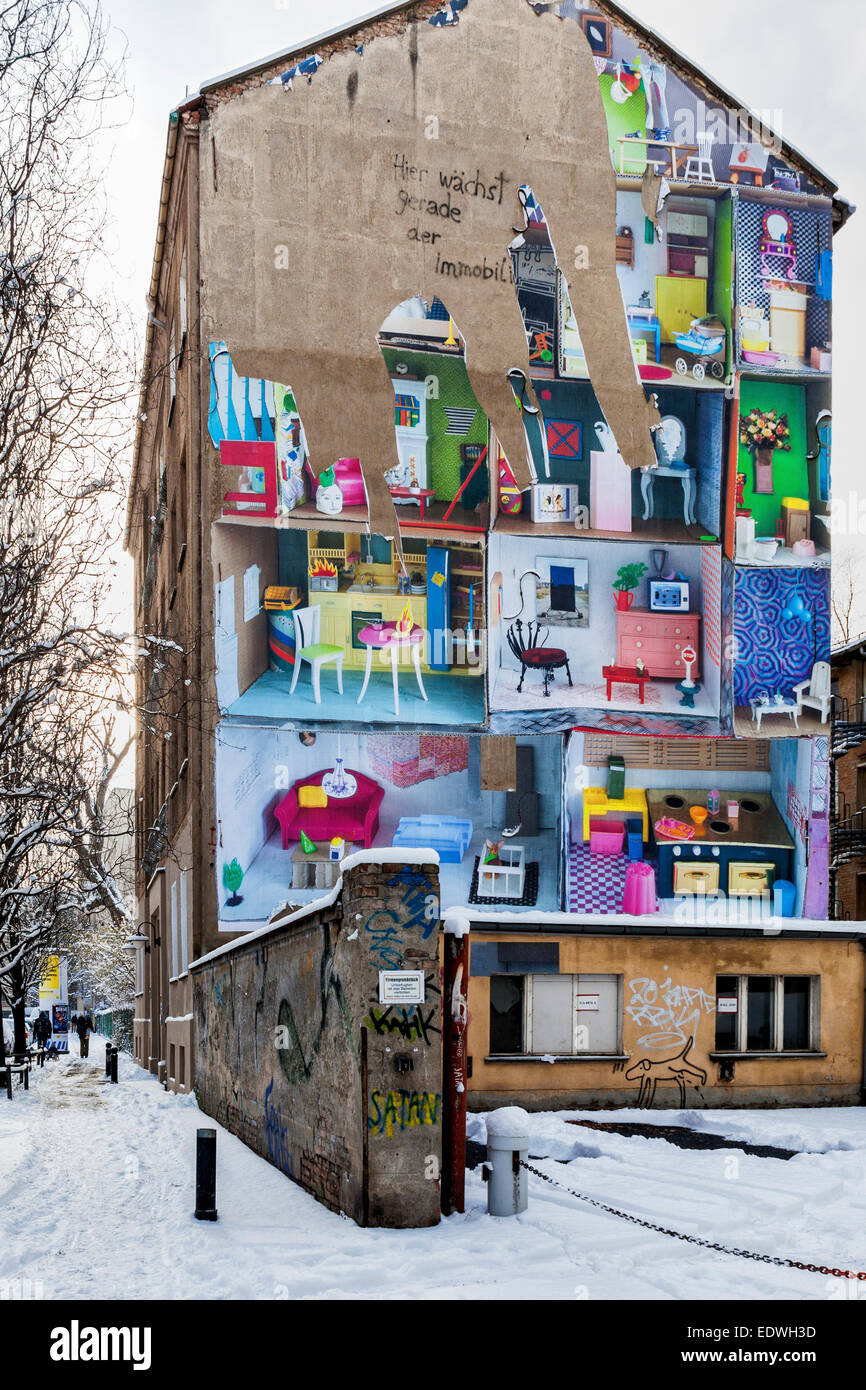 Torn Paper street art - side of a building with illustration of ...