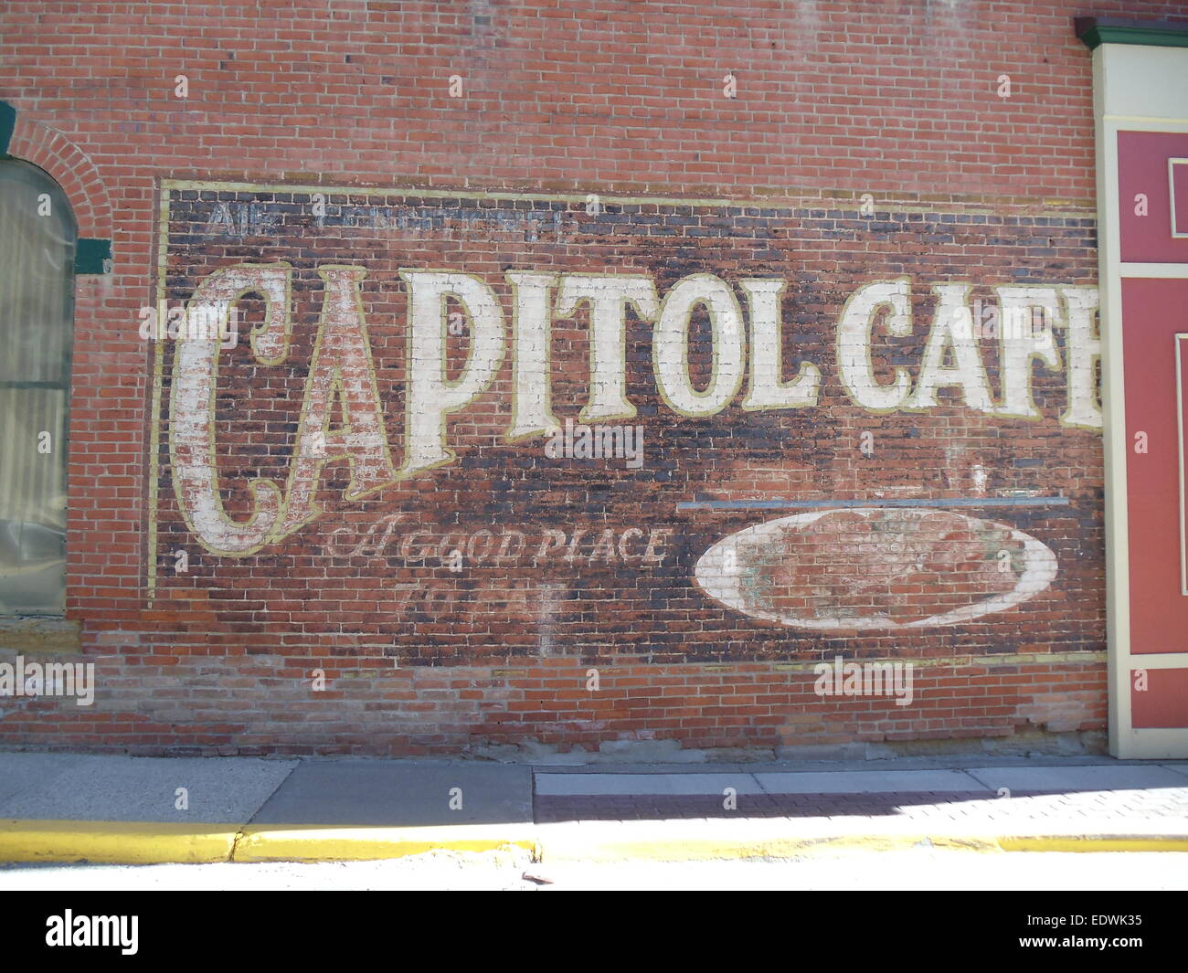 brick wall advertisement Stock Photo - Alamy