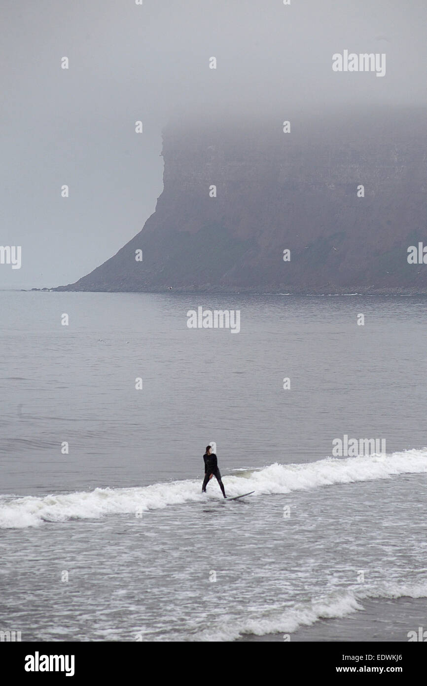 Surfing near Saltburn Stock Photo - Alamy