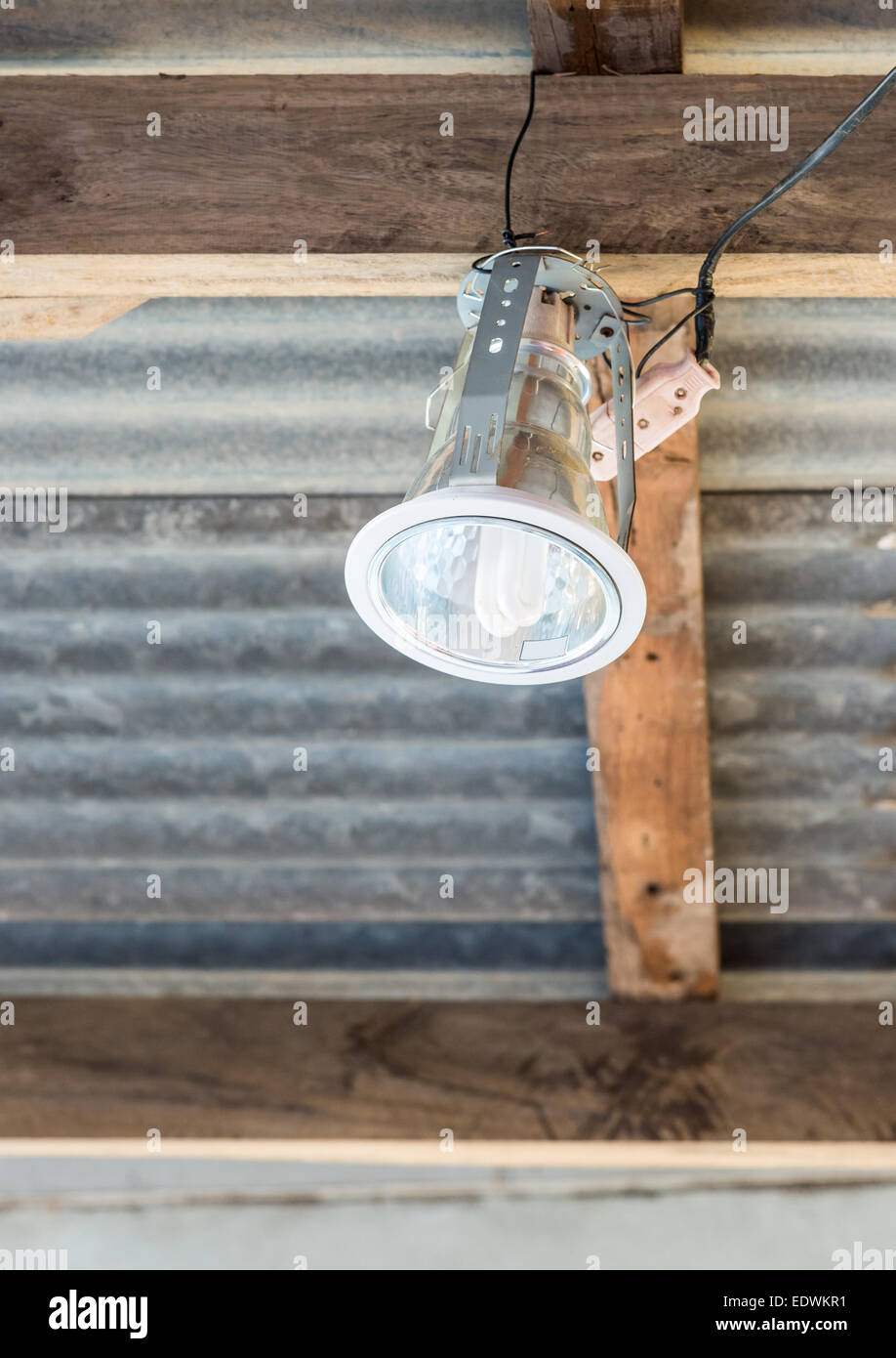 Small downlight is hanging on the wooden frame Stock Photo - Alamy