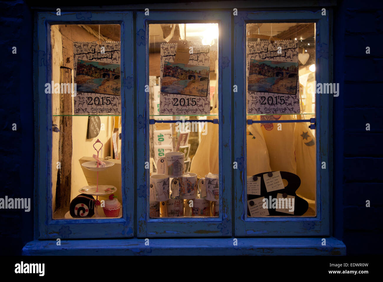 Shop window at night with interior light on Stock Photo - Alamy