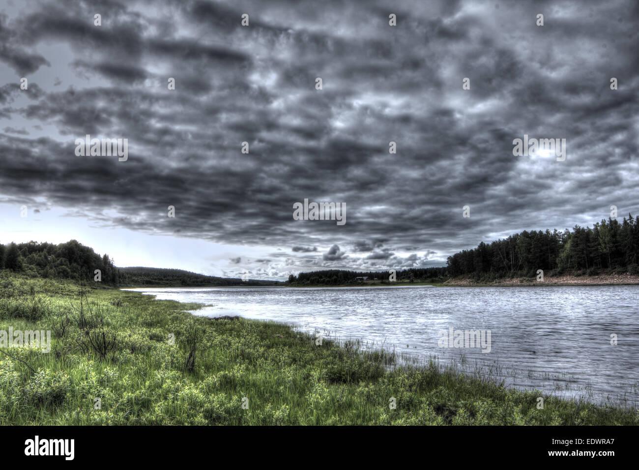 Picturesque landscape with forest and wide river Stock Photo - Alamy
