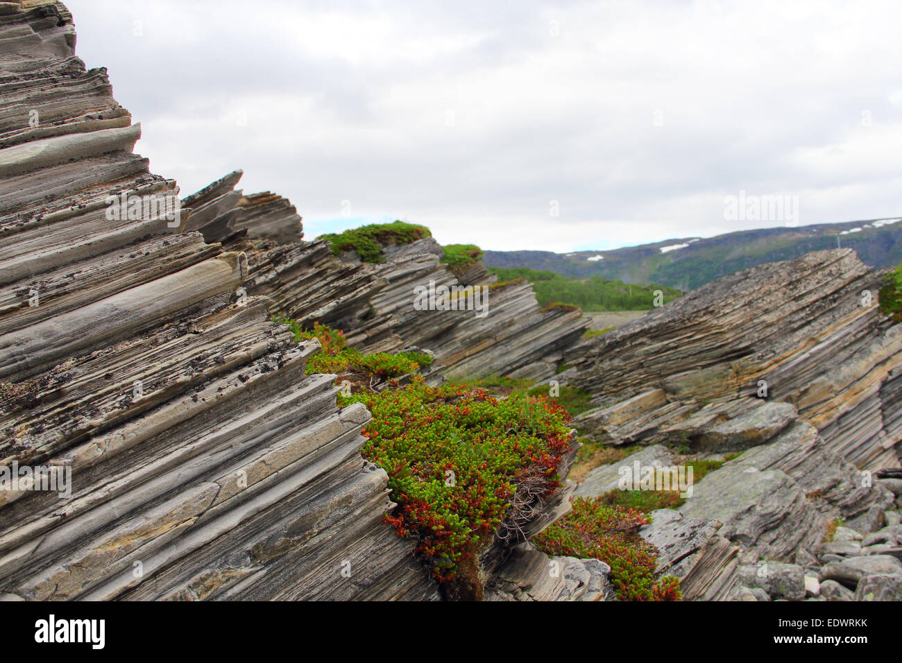 Geological rock layers of norwegian mounatins Stock Photo - Alamy