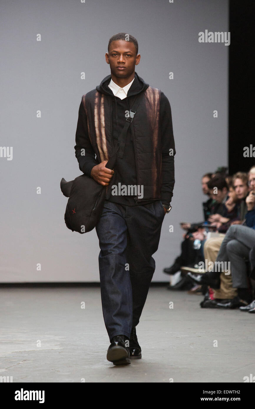 London, UK. 10 January 2015. A model walks the runway at the ...